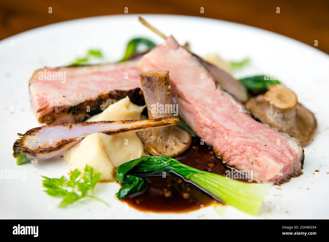 Tender wagyu grilled beef steak served with shitake mushrooms and bok ...
