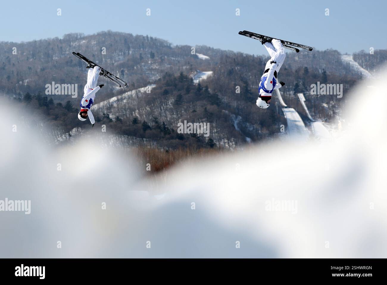 Harbin,China.11th February 2025. Geng Hu and Yang Yuheng of China ...