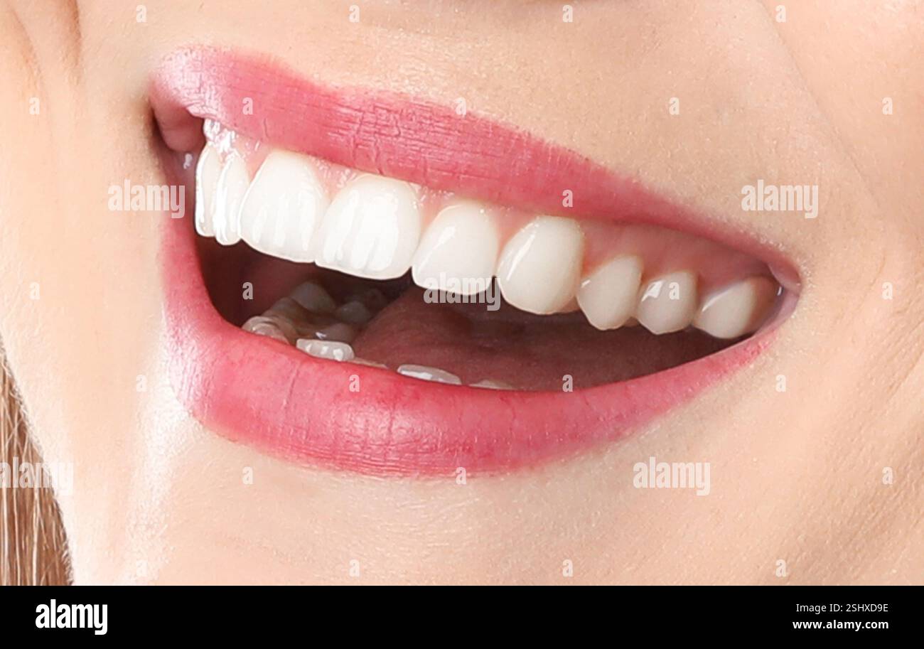 Straight white teeth hi-res stock photography and images - Alamy