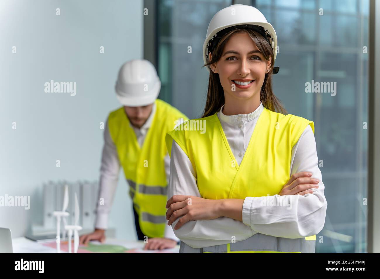 Engineers working together in the office on a new construction project ...