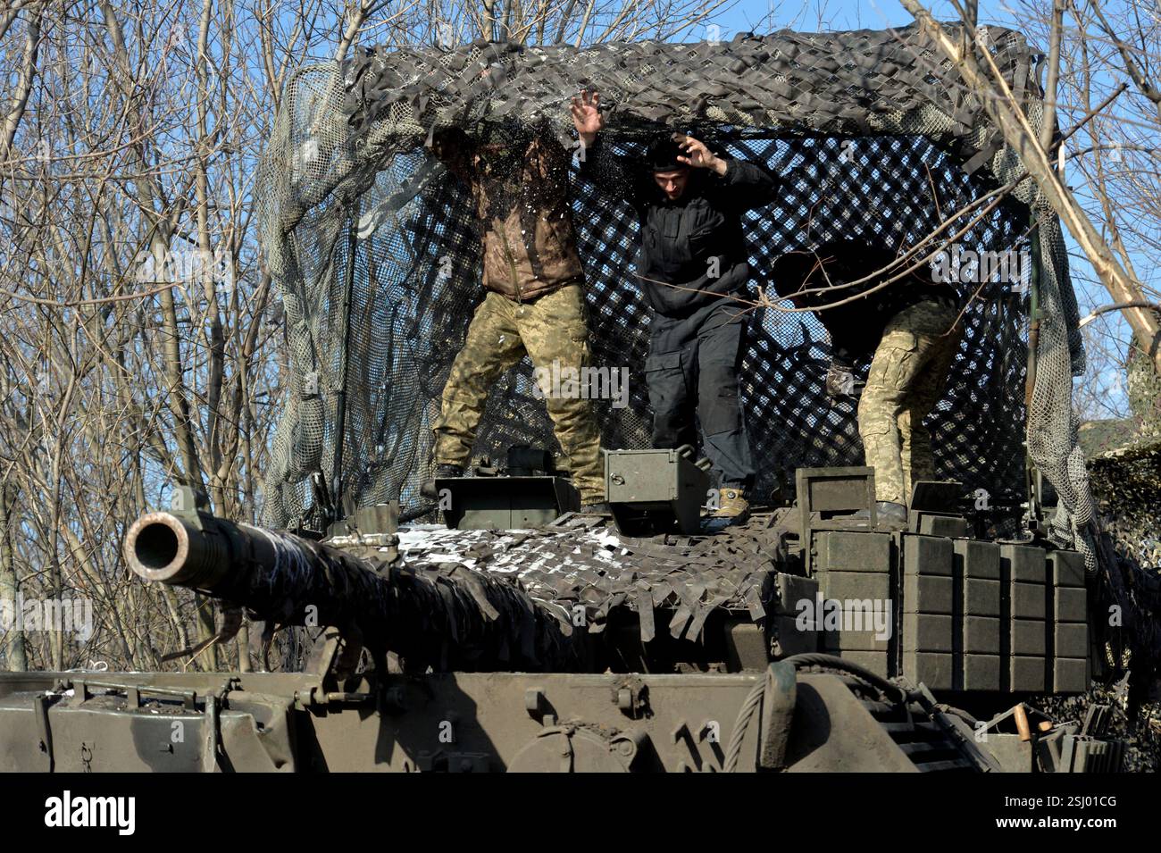 DONETSK REGION, UKRAINE - FEBRUARY 9, 2025 - Soldiers man a tank as the ...