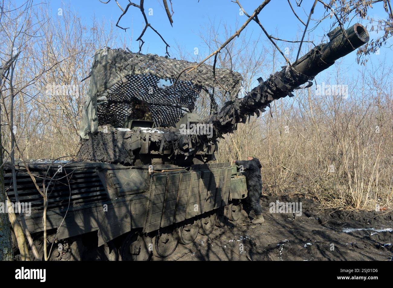 DONETSK REGION, UKRAINE - FEBRUARY 9, 2025 - Soldiers man a tank as the ...