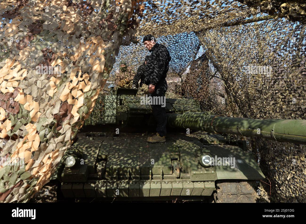DONETSK REGION, UKRAINE - FEBRUARY 9, 2025 - Soldiers man a tank as the ...