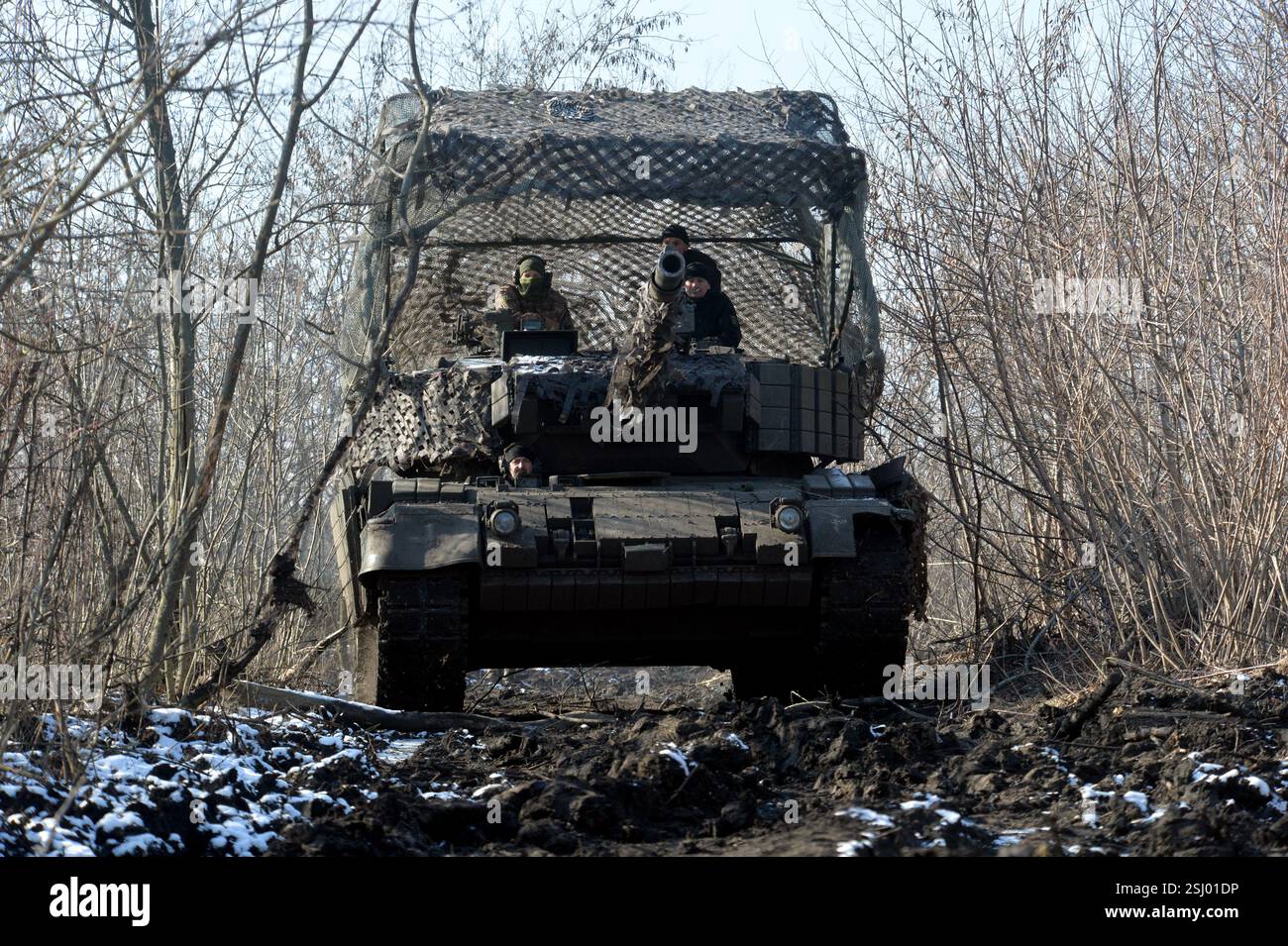 DONETSK REGION, UKRAINE - FEBRUARY 9, 2025 - Soldiers man a tank as the ...