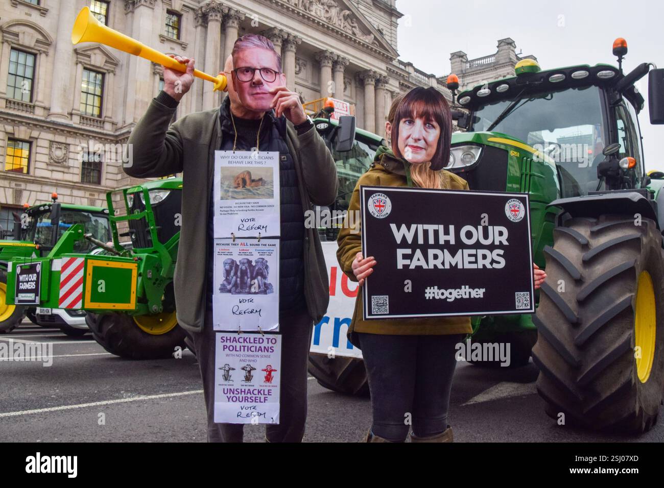 London, UK. 10th February 2025. Protesters wear Keir Starmer and Rachel ...