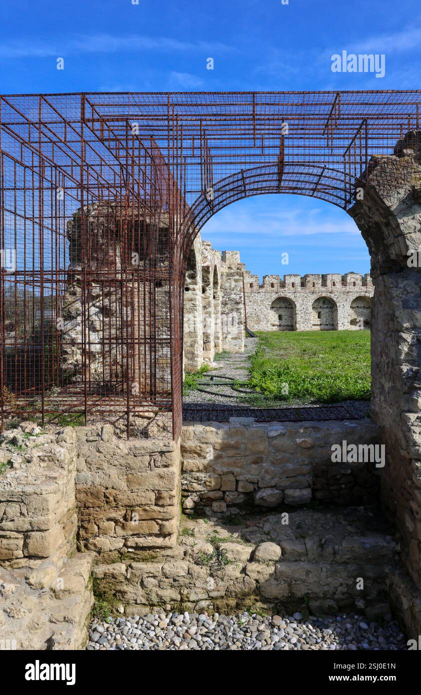 iron structure replacing the stone arch of the perimeter wall of the ...