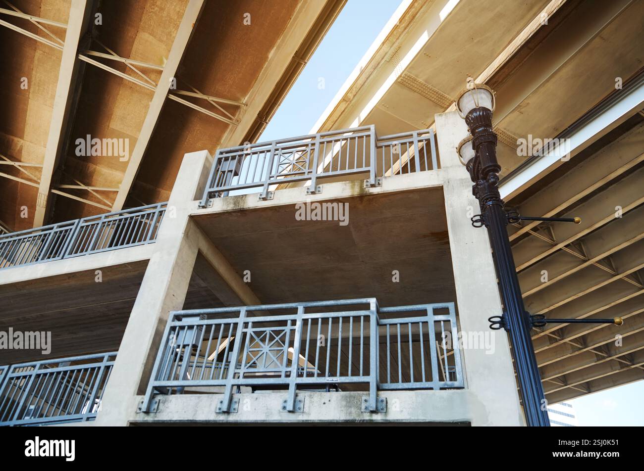 Low angle view of underneath a highway bridge and pedestrian area Stock ...