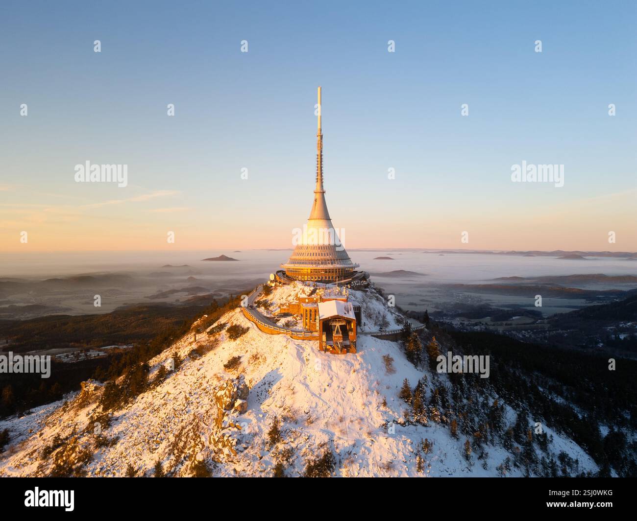 Jested Mountain showcases a breathtaking sunrise, illuminating the ...