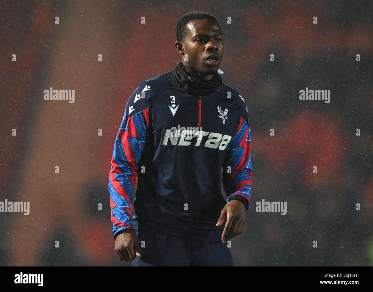 Doncaster, UK. 10th Feb, 2025. Tyrick Mitchell of Crystal Palace warms ...