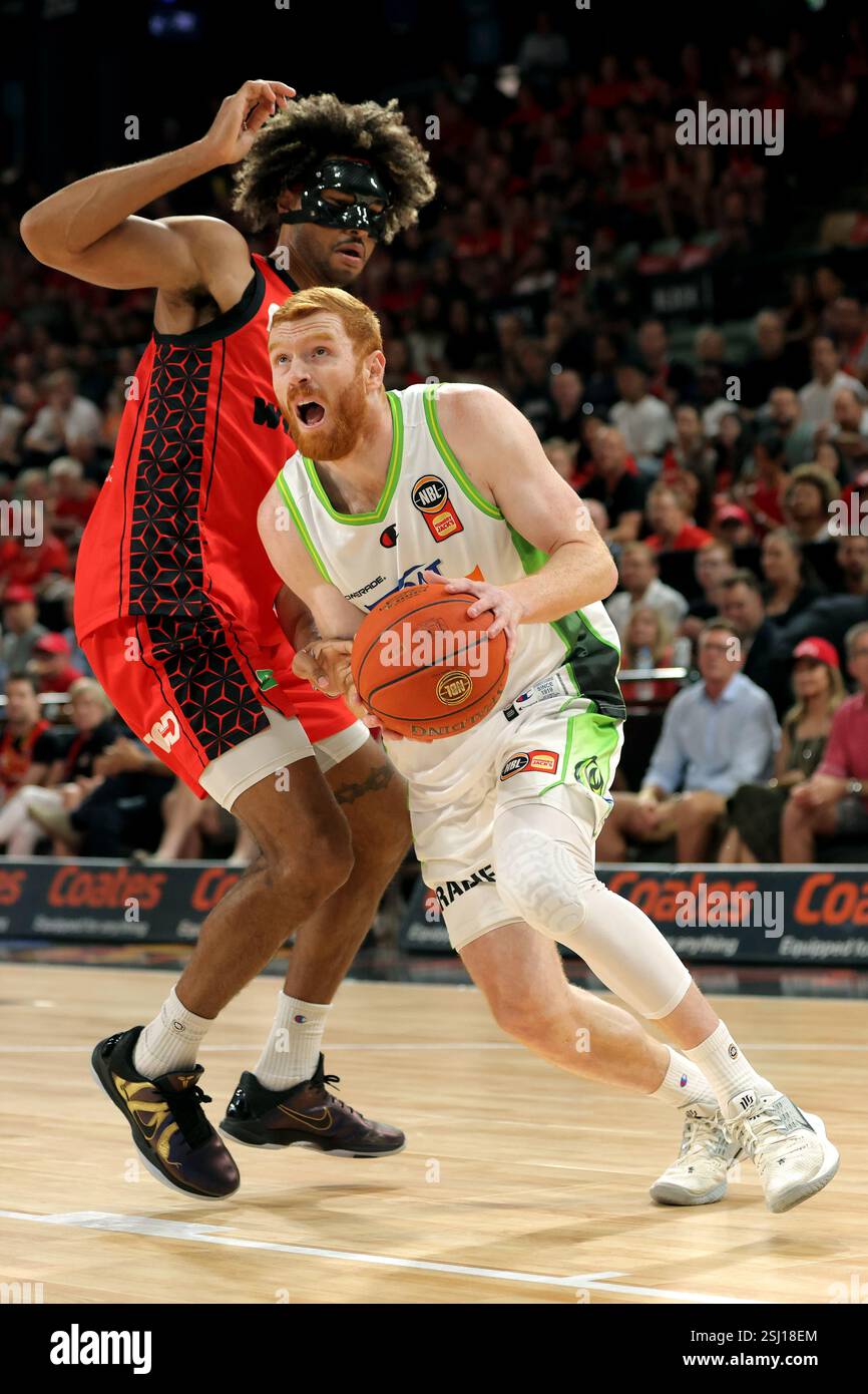 Perth, Australia. 11th Feb, 2025. Angus Glover of the Phoenix drives ...