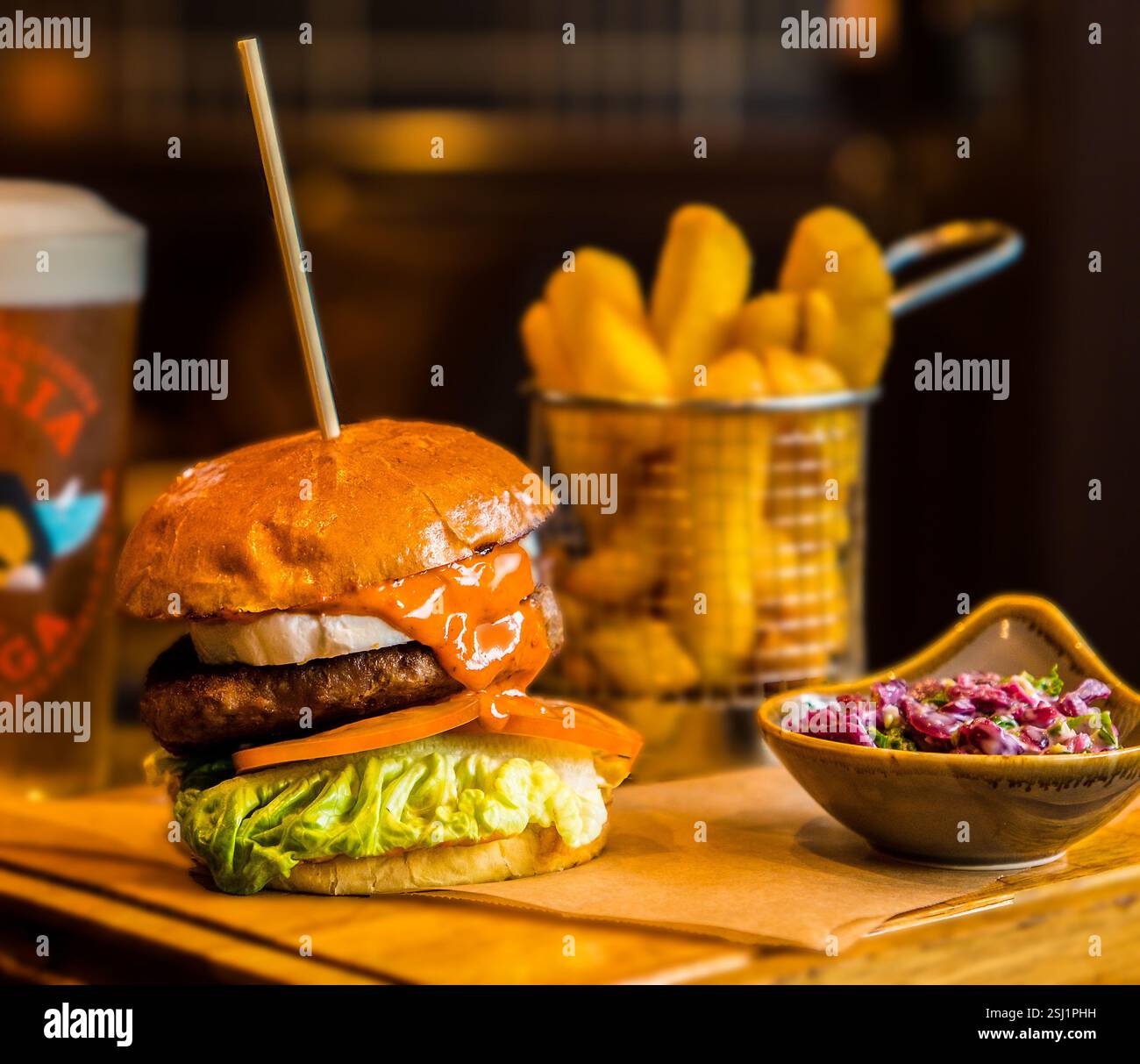 a posh burger with chips in a UK restaurant Stock Photo - Alamy
