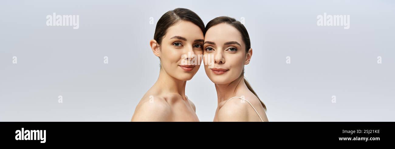 Twin sisters stand close together, radiating beauty and confidence with ...