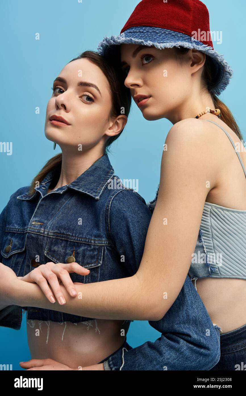Two beautiful sisters pose together, showcasing style and elegance ...