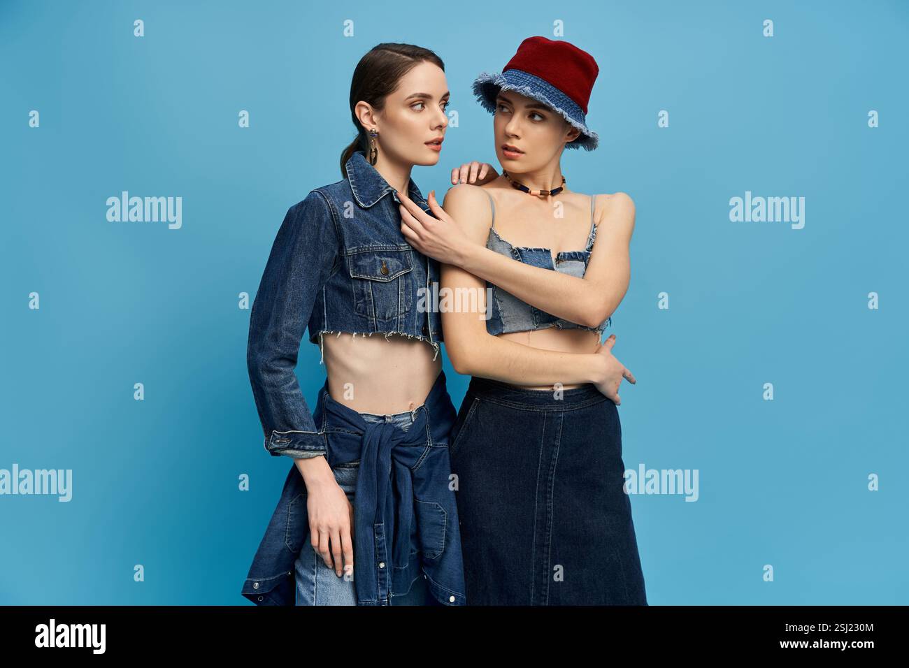 Two beautiful sisters stand together, showcasing their unique styles in ...