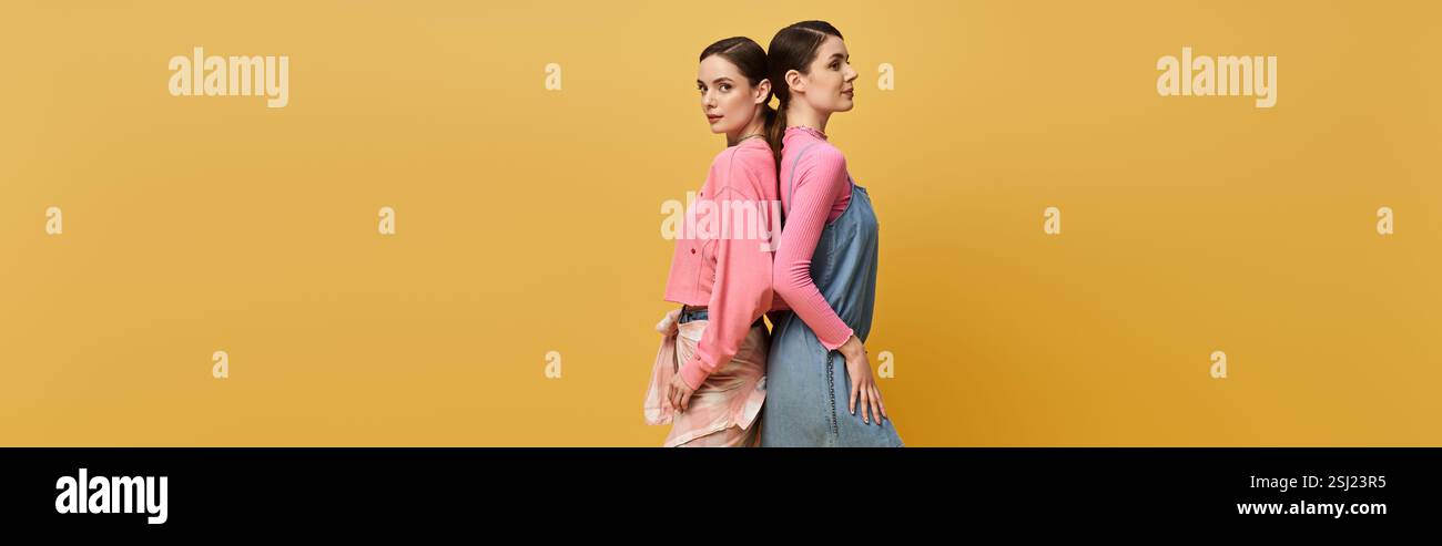 Two beautiful twins back to back, showcasing their unique styles in a ...