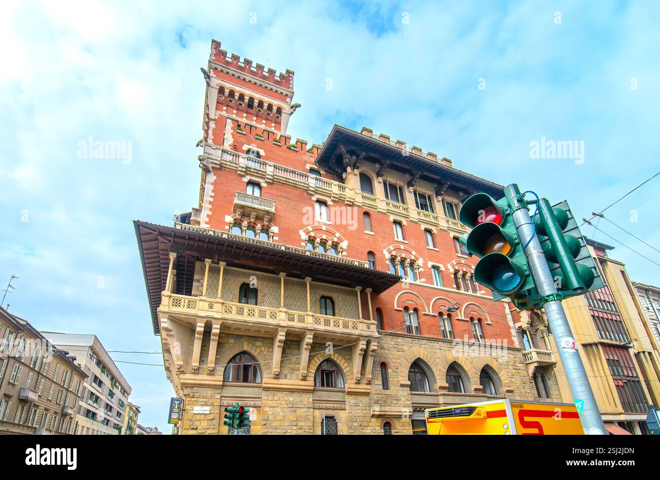 Milan, Italy. Traditional colorful building with balconies, shutter ...