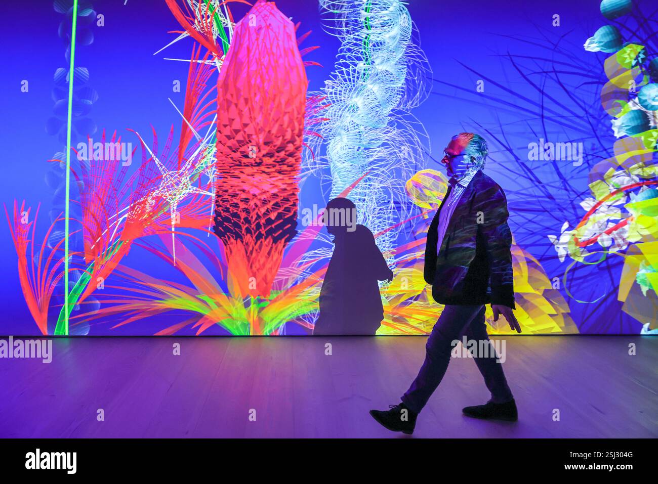 London, UK. 11th Feb, 2025. Artist Miguel Chevalier, immersed in his ...