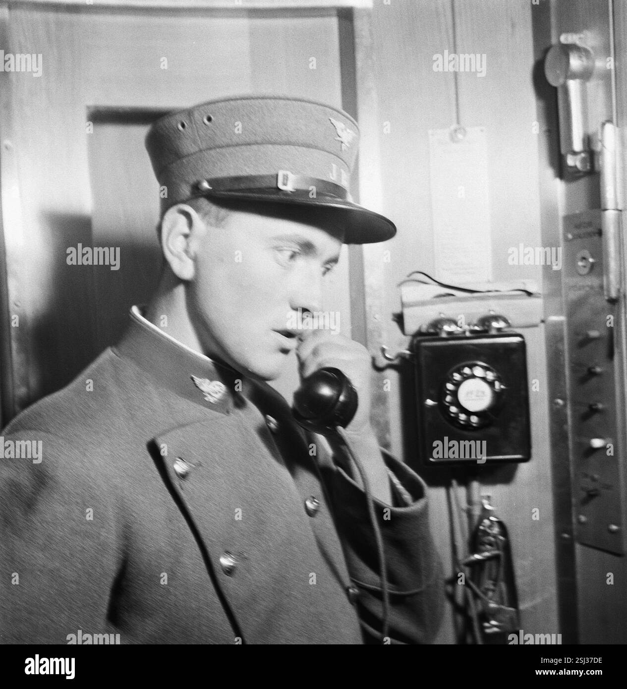 Jungfraujoch 1942: Liftboy #Jungfraujoch 1942:lift boy Stock Photo - Alamy