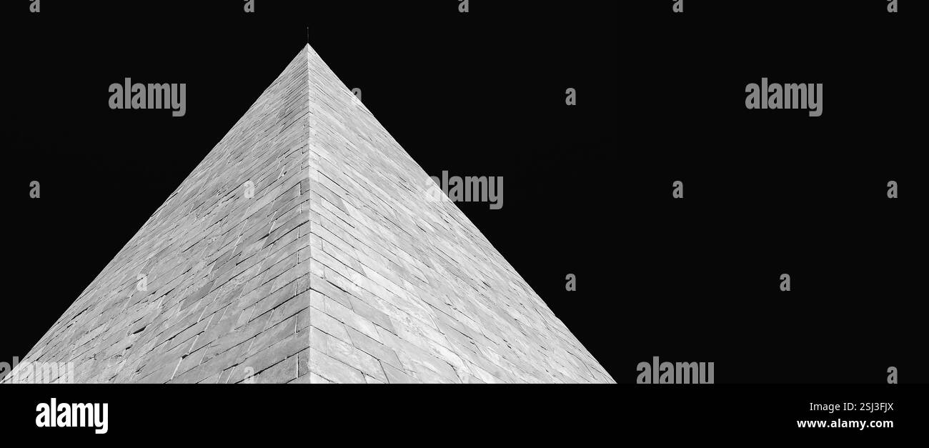 White marble Pyramid of Cestius ancient ruins, now part of Rome ancient ...
