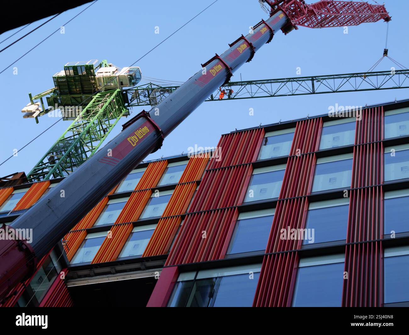 City lifting crane assembling in Broadgate London UK, Crane assembly ...
