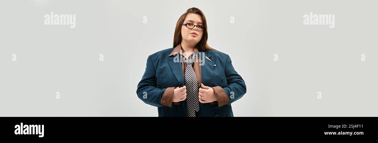 Young and beautiful plus size woman exudes confidence while styled in ...