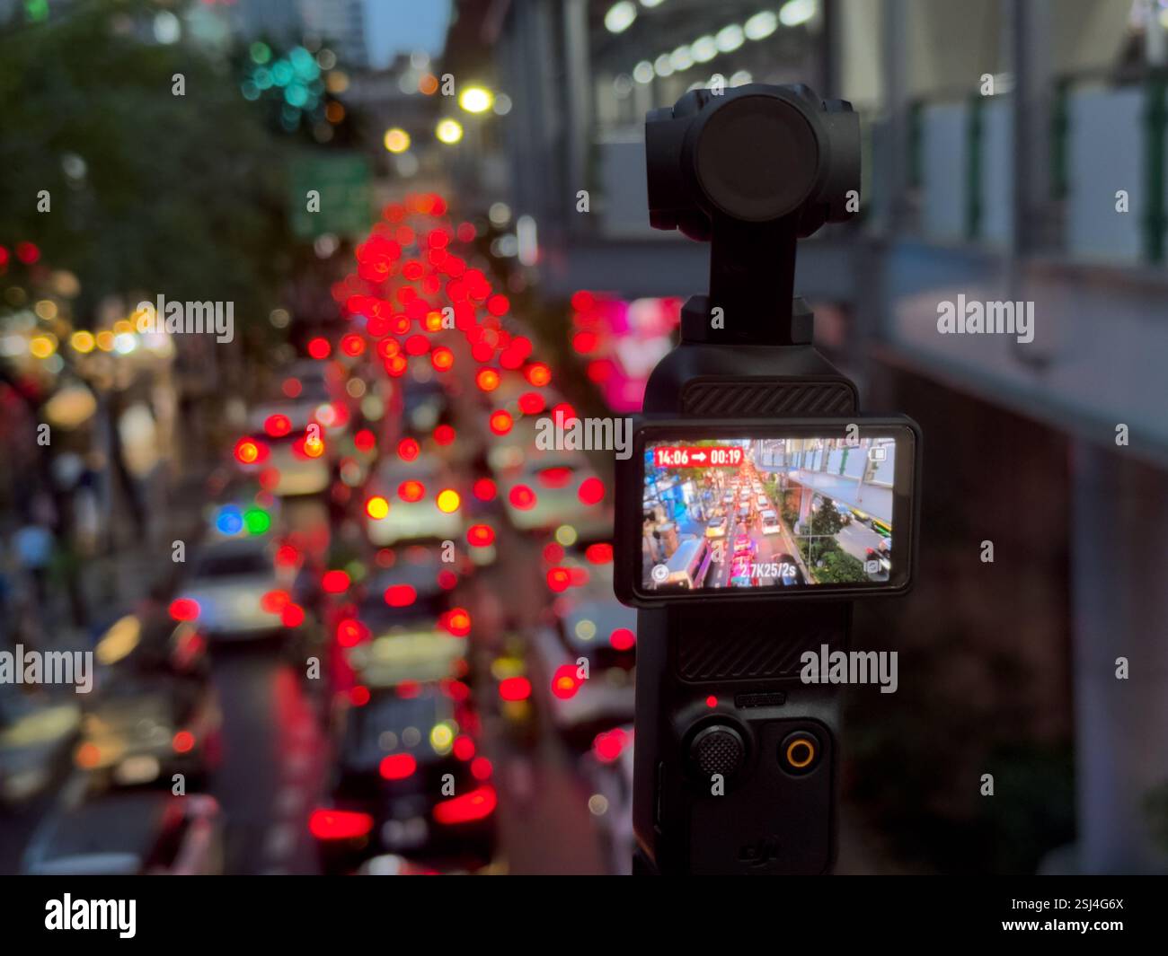 An evening shot on Sukhumvit Road in Bangkok, captured through the lens ...