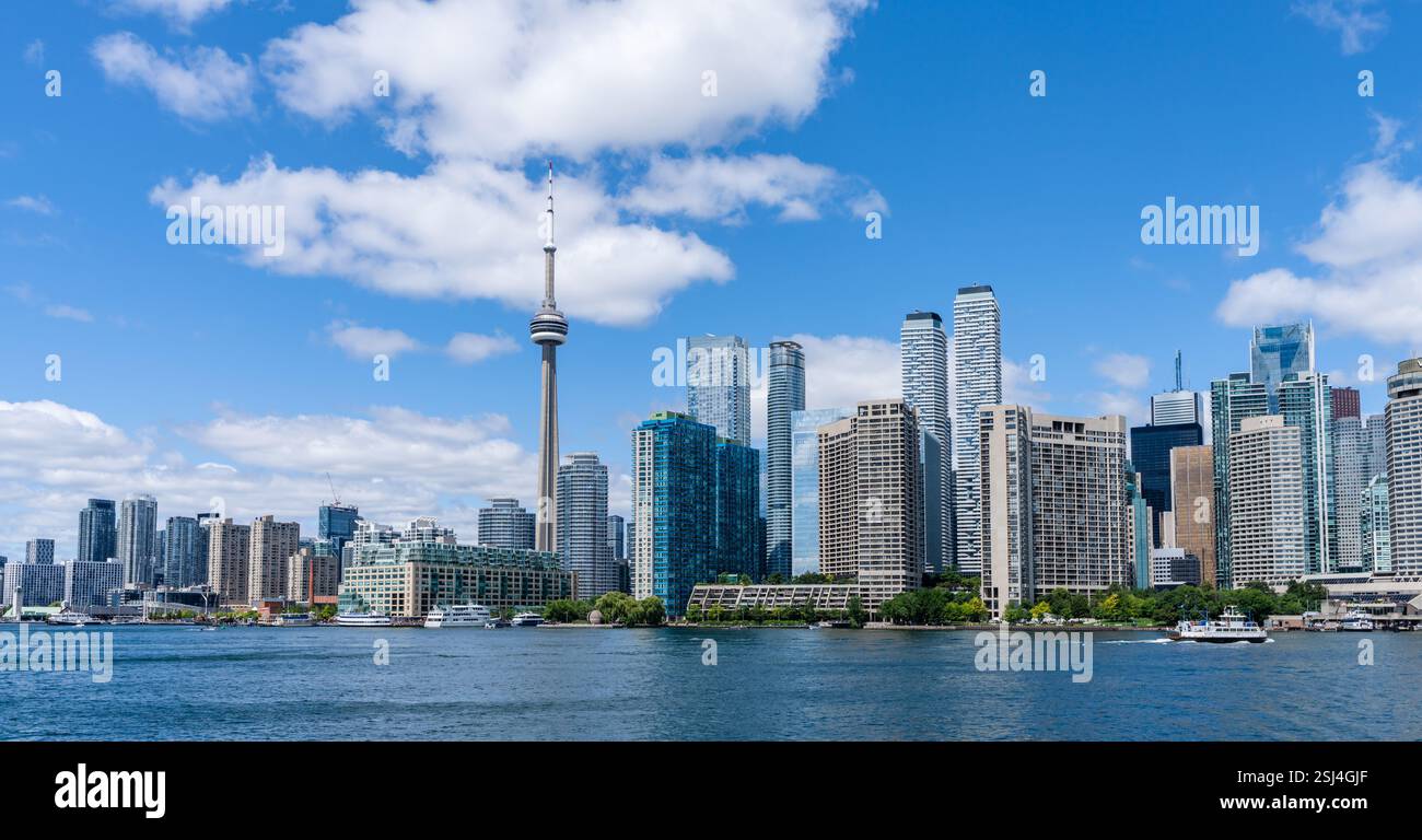 Toronto City downtown skyline. Toronto Island Ferry on inner Harbour ...