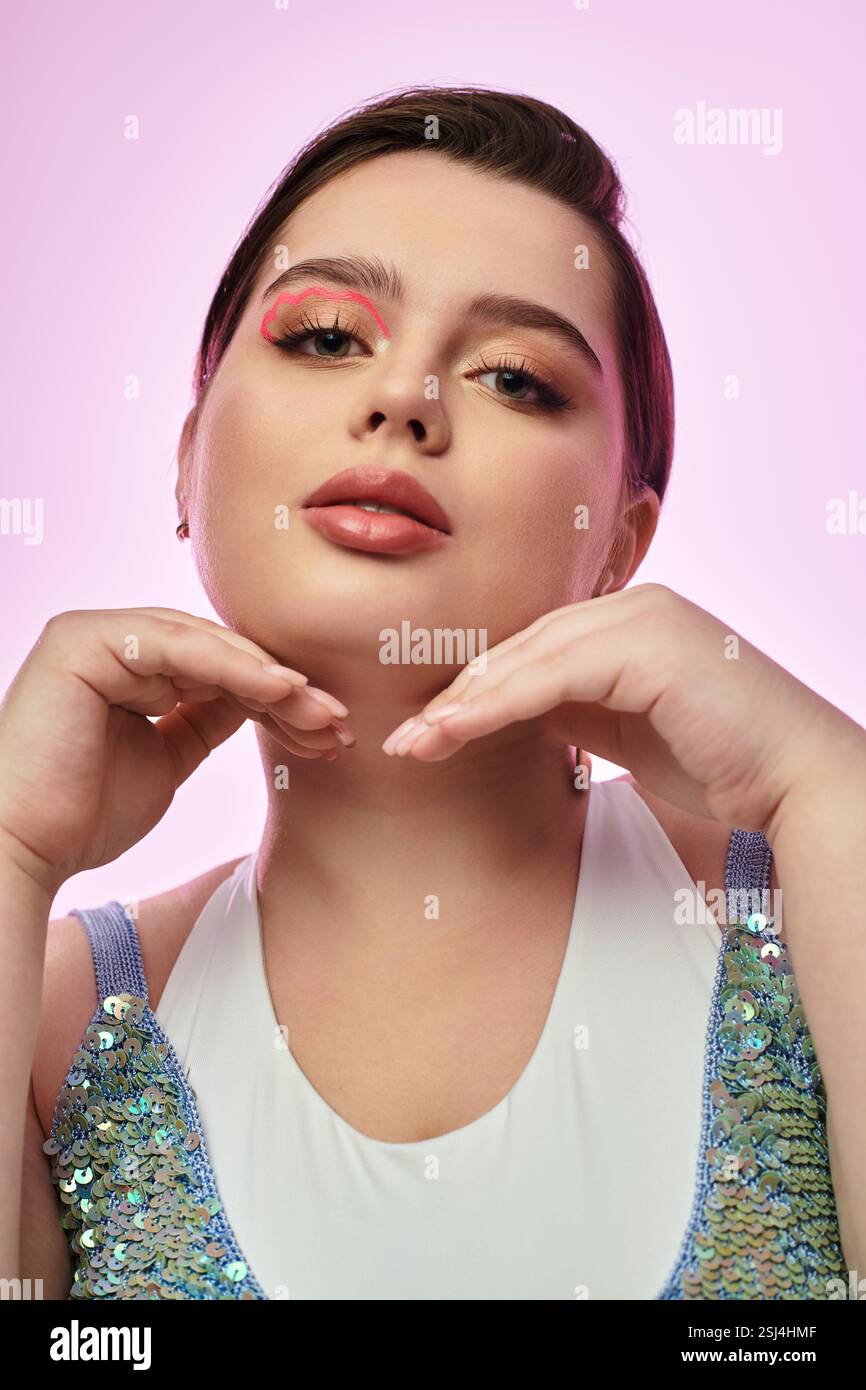 A beautiful young plus size woman displays her inner strength and style ...