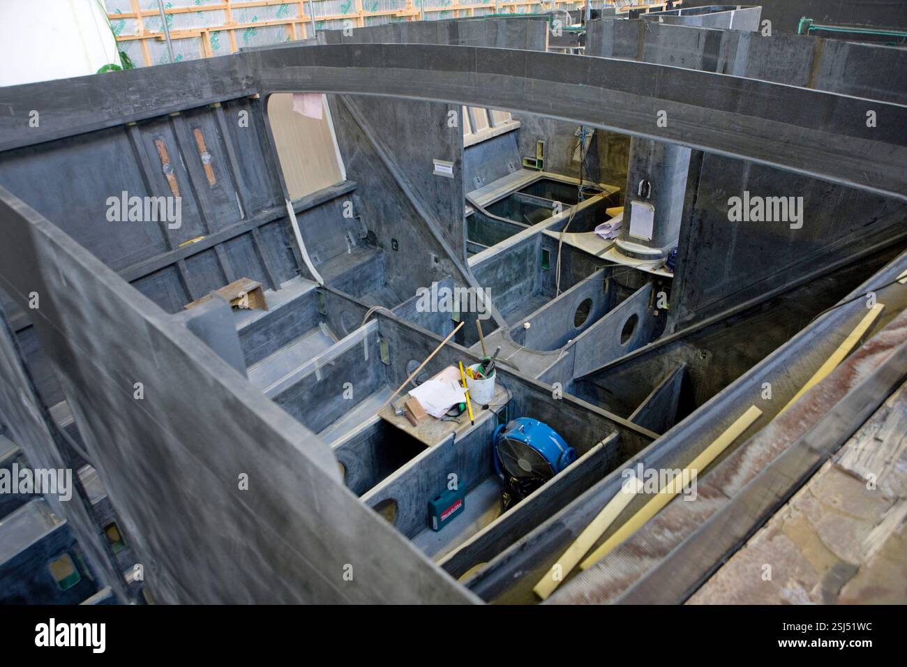 Shipbuilding Industry. Working on glass fiber hull of super sailing ...