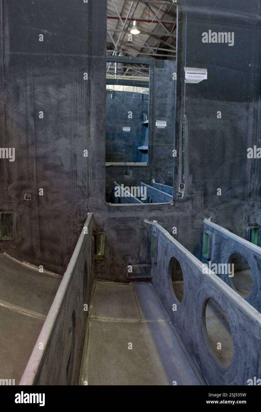 Shipbuilding Industry. Working on glass fiber hull of super sailing ...