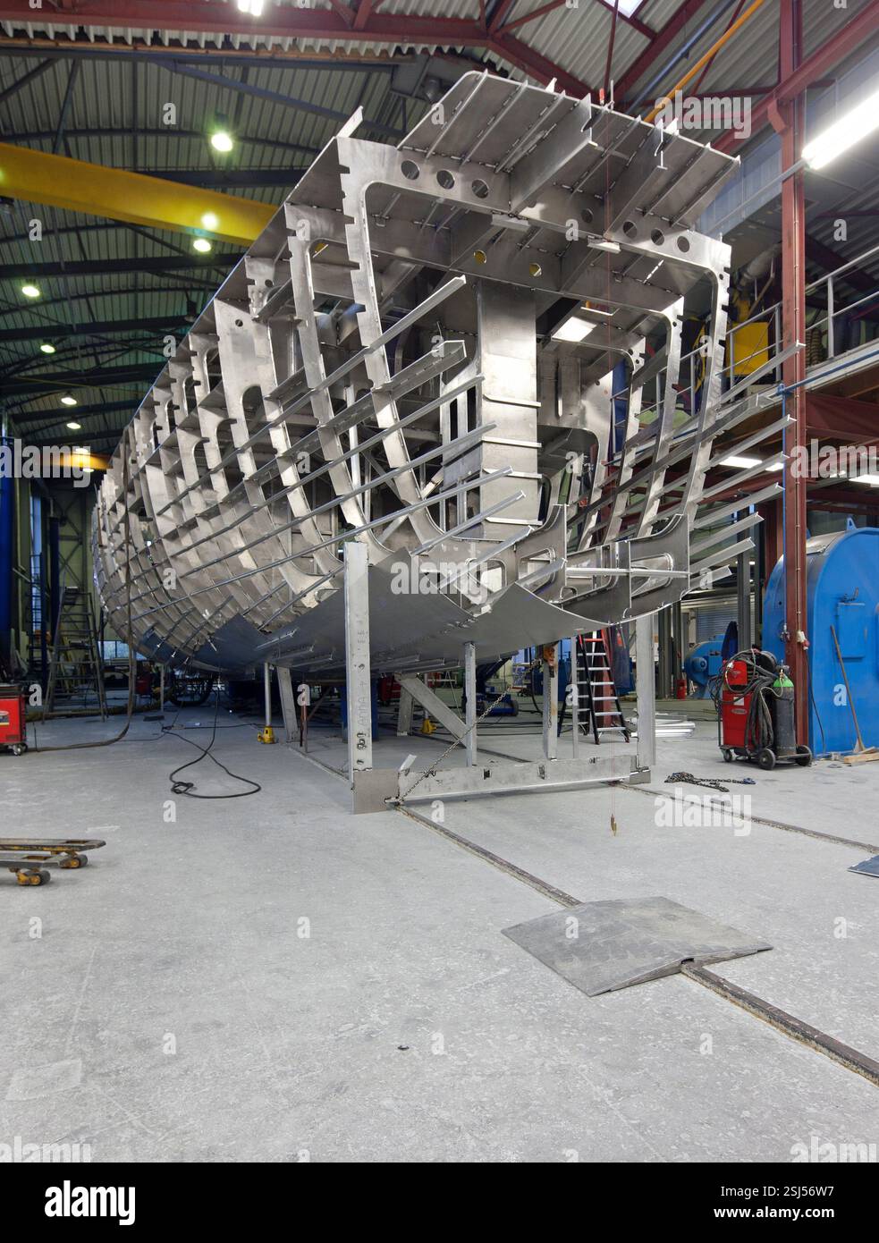 Shipbuilding Industry. Aluminium hull of a super sailing yacht being ...