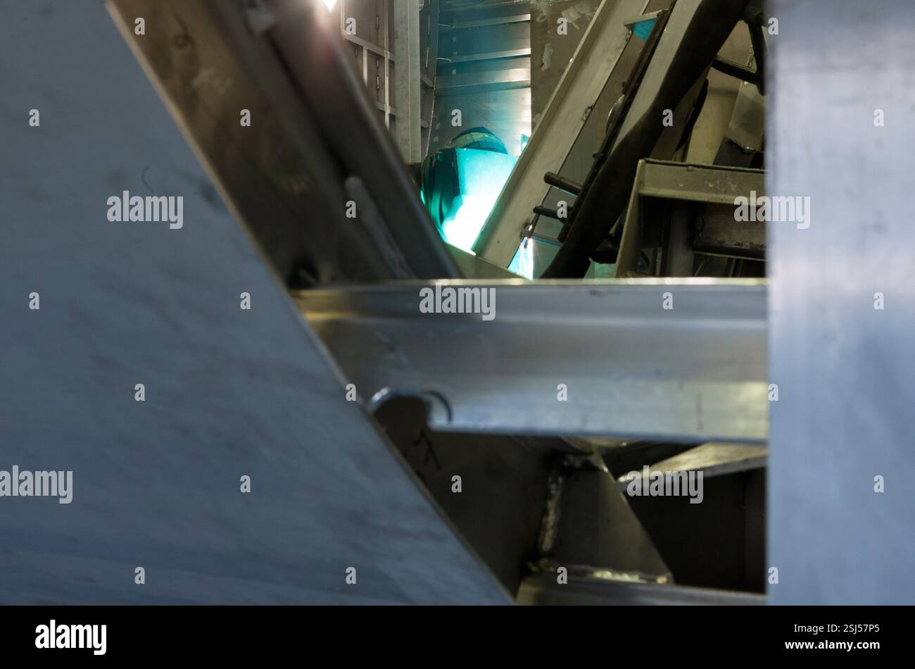 Welder at work welding aluminium. Shipbuilding Industry. Aluminium hull ...