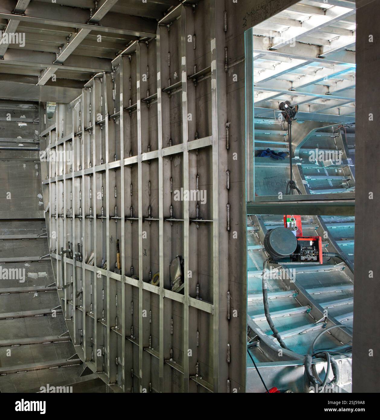 Welder at work welding aluminium. Shipbuilding Industry. Aluminium hull ...