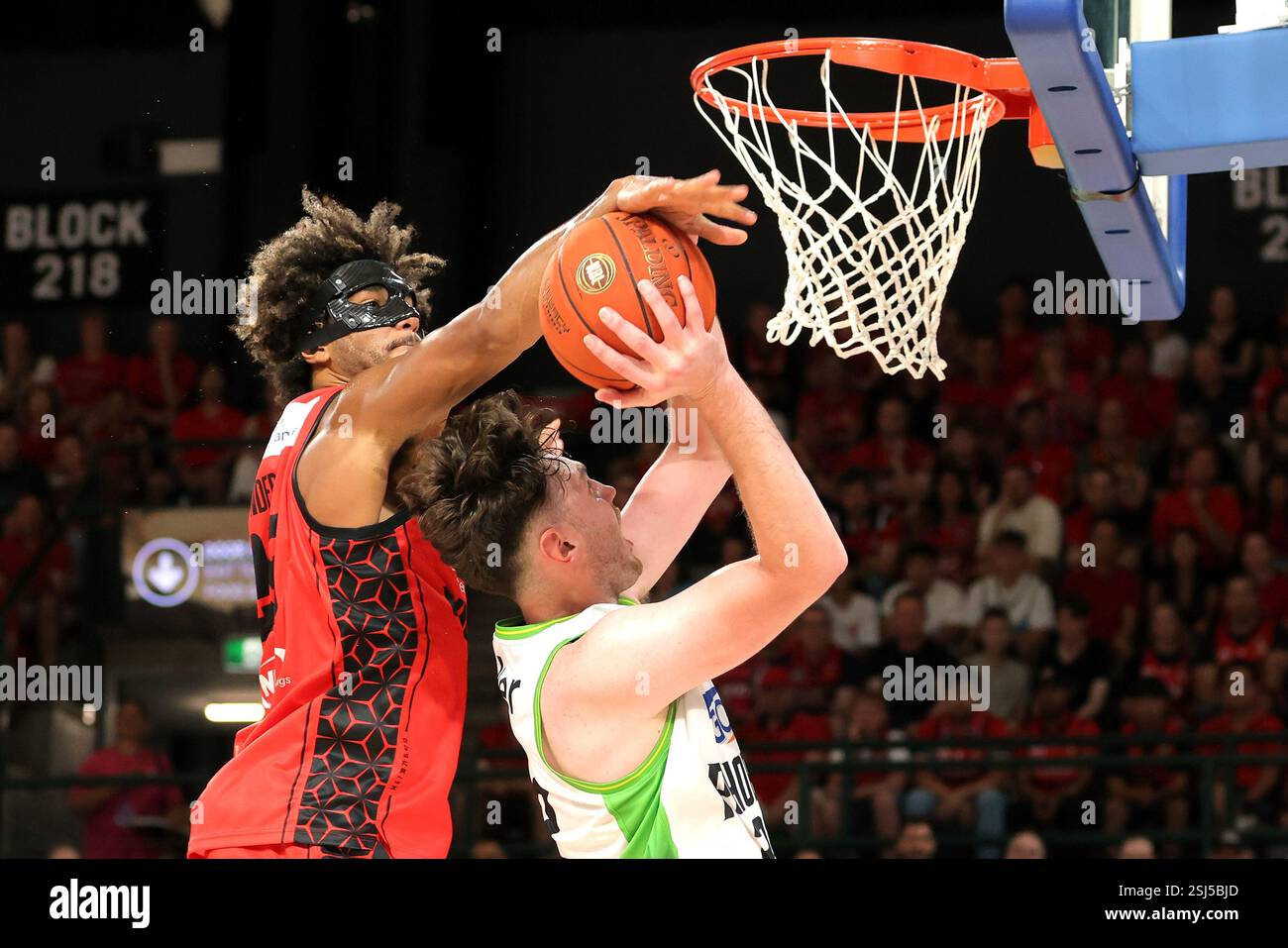 Perth, Australia. 11th Feb, 2025. Keanu Pinder of the Wildcats blocks a ...