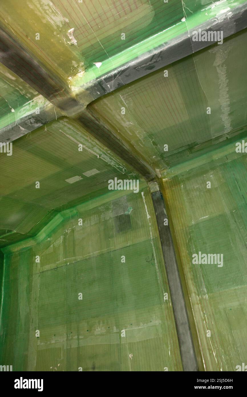 Shipbuilding Industry. Glass fiber hull of a yacht being build at the ...