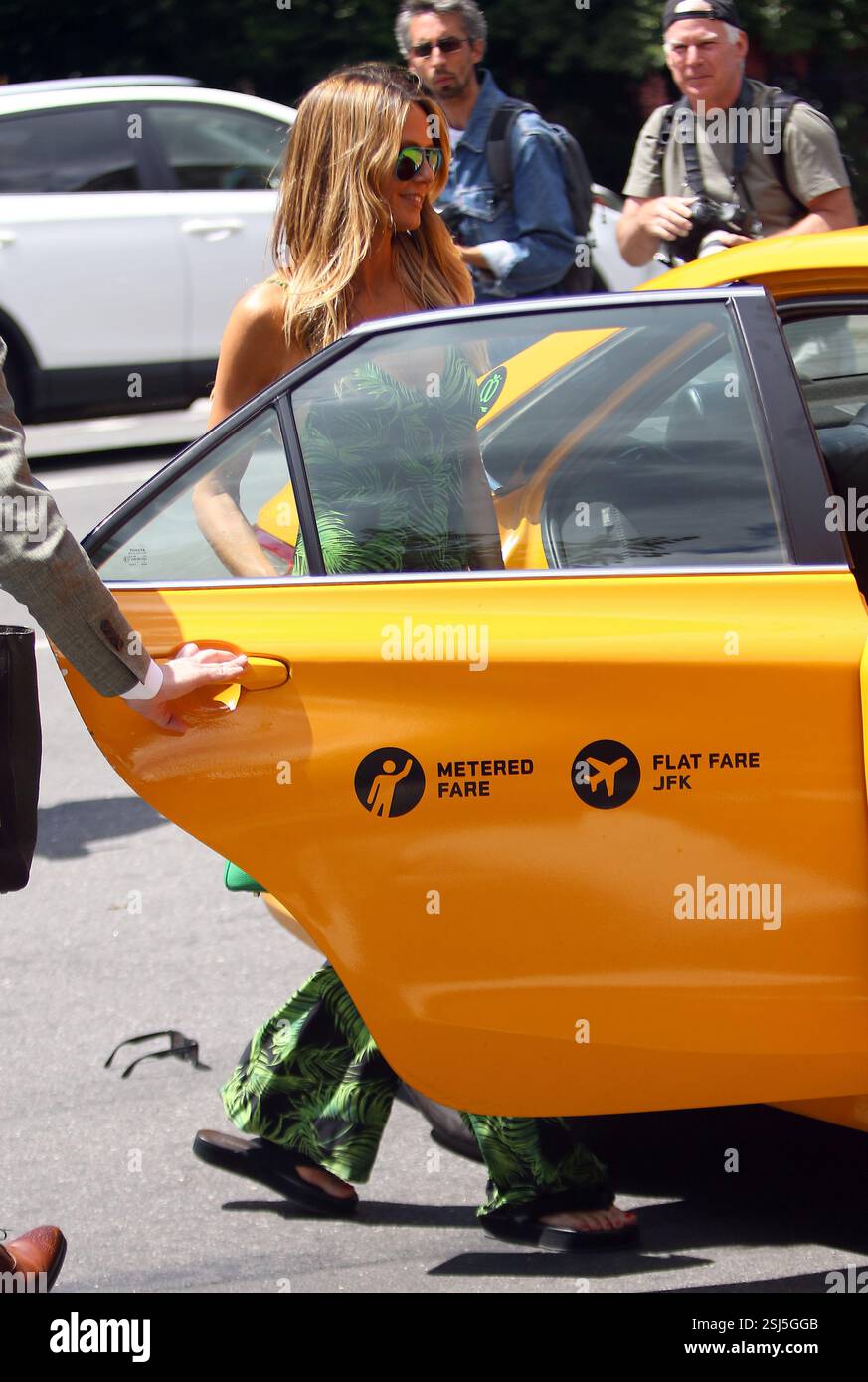 TV personality Heidi Klum and her 'Project Runway' co-presenter Tim ...