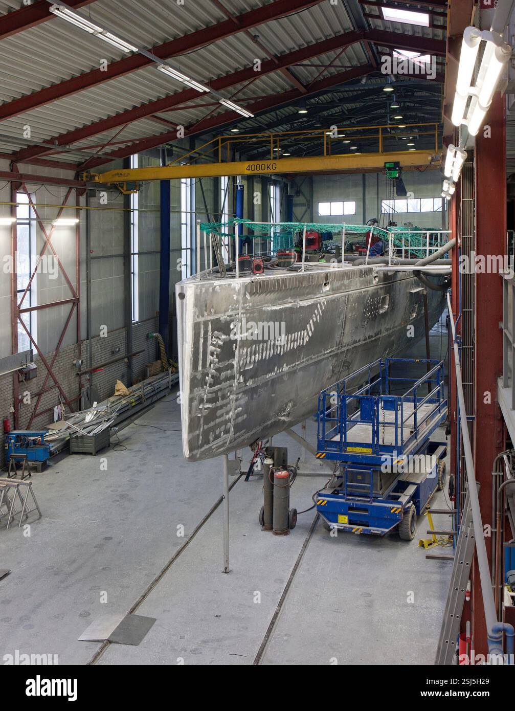 Shipbuilding Industry. Aluminium hull of a super sailing yacht being ...