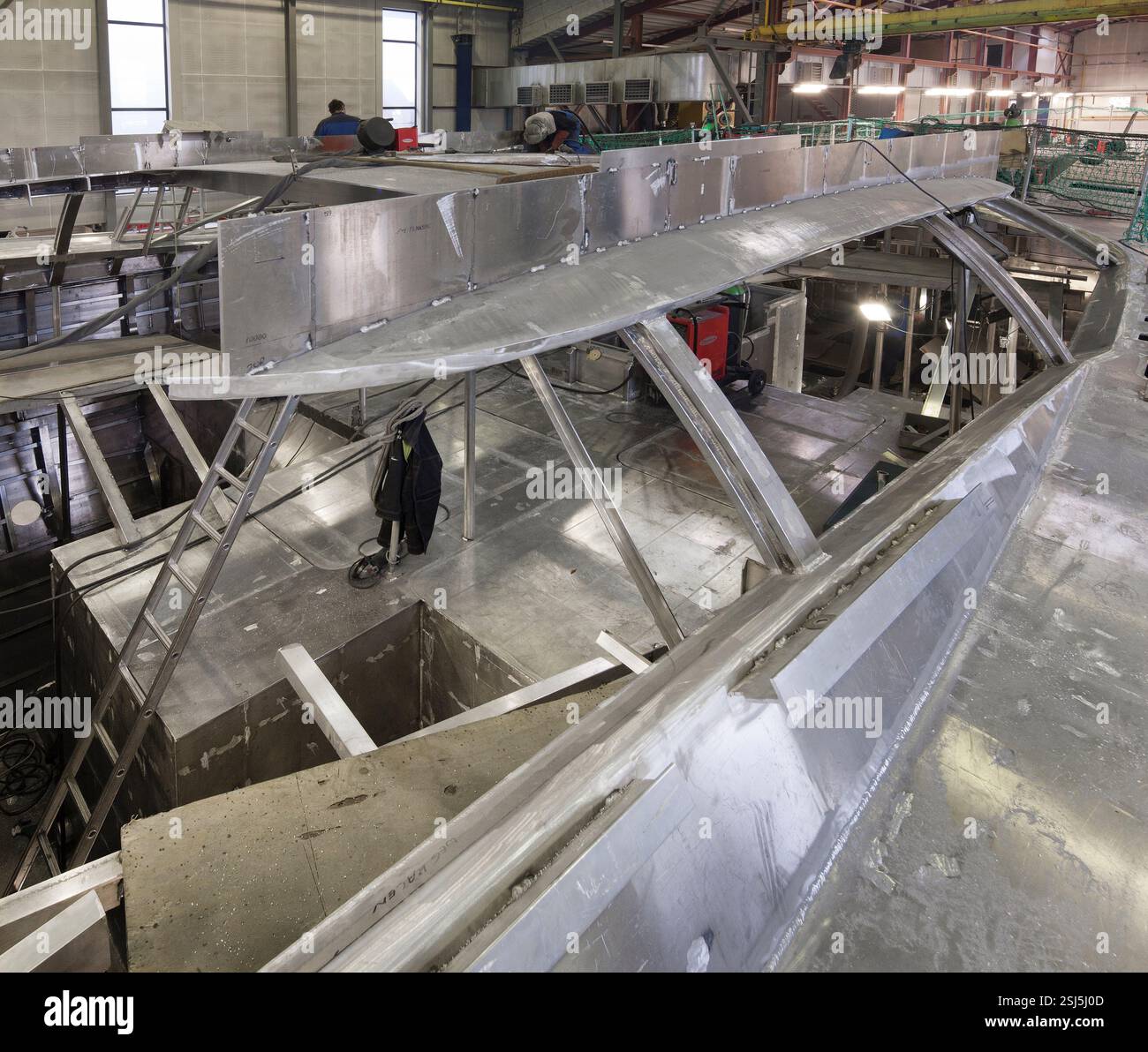 Shipbuilding Industry. Aluminium hull of a super sailing yacht being ...