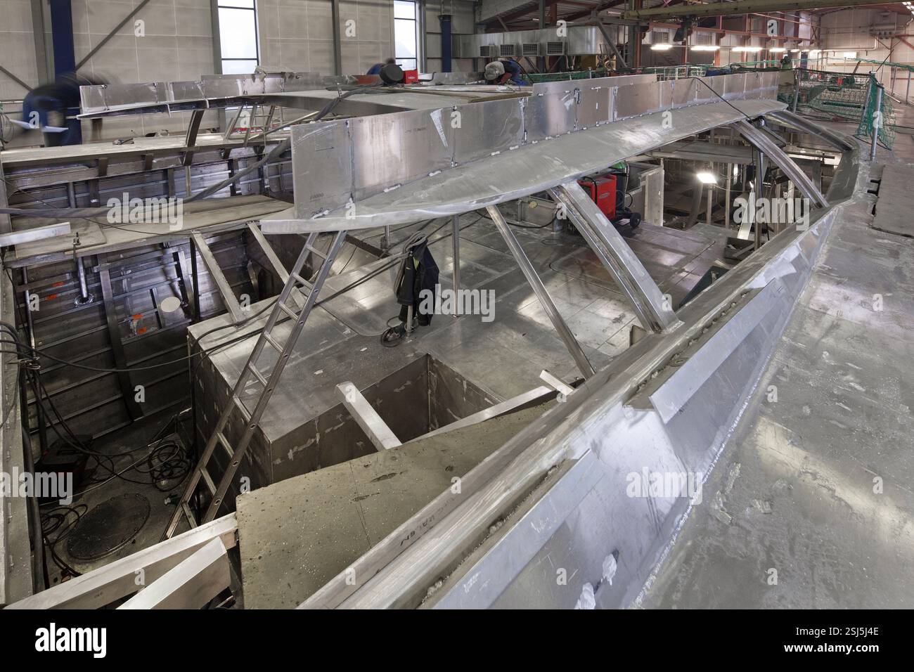 Shipbuilding Industry. Aluminium hull of a super sailing yacht being ...