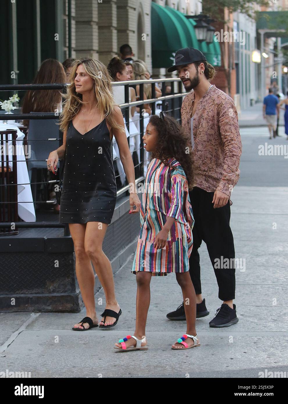 TV personality Heidi Klum, her mother Erma, her boyfriend musician Tom ...
