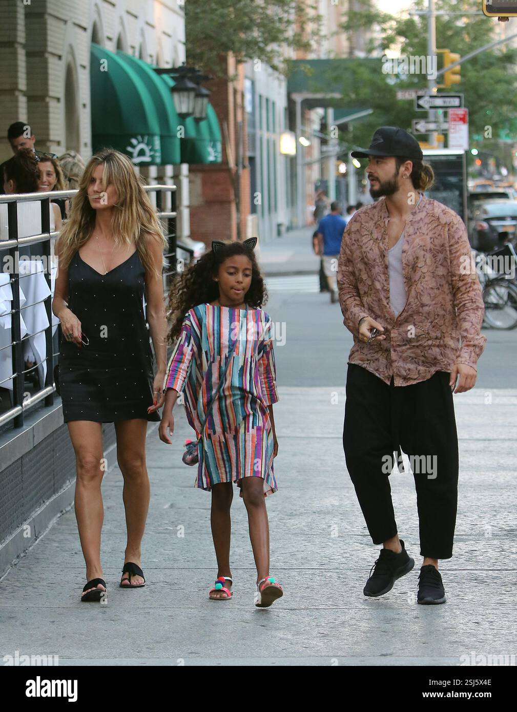 TV personality Heidi Klum, her mother Erma, her boyfriend musician Tom ...