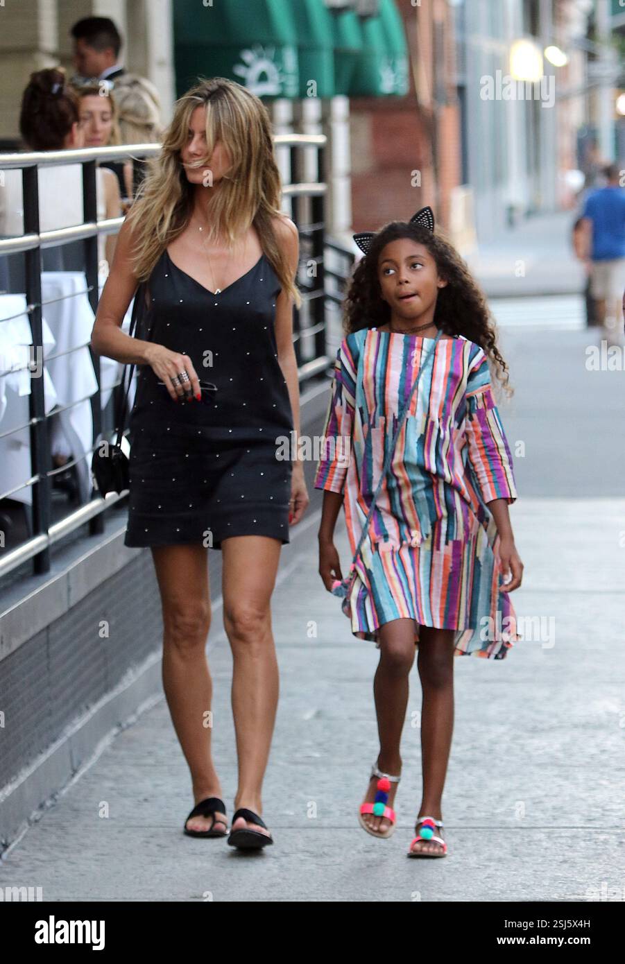 TV personality Heidi Klum, her mother Erma, her boyfriend musician Tom ...