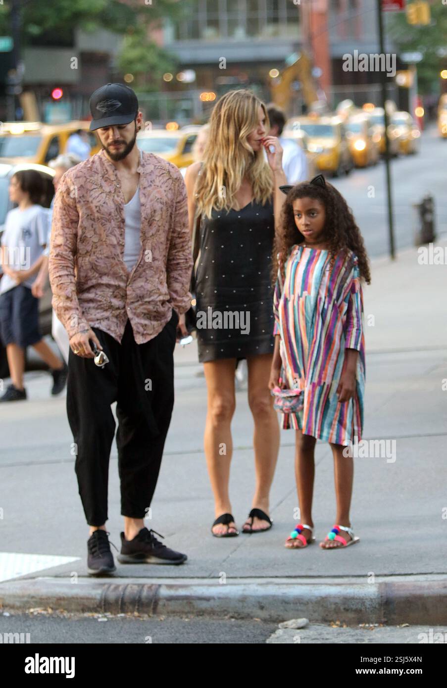 TV personality Heidi Klum, her mother Erma, her boyfriend musician Tom ...