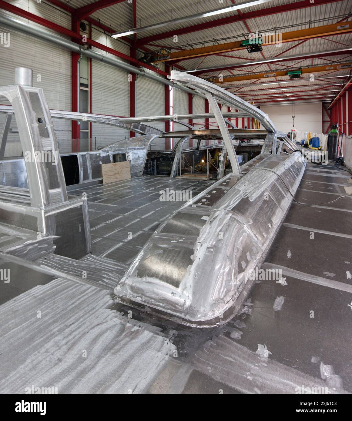 Shipbuilding Industry. Aluminium hull of a super sailing yacht being ...