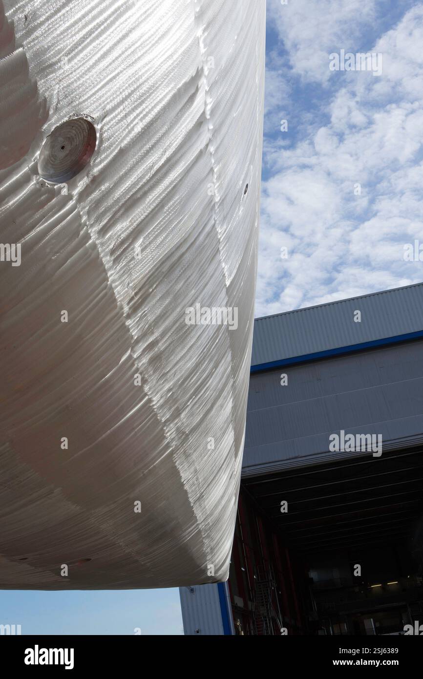 Shipbuilding Industry. Aluminium hull of a super sailing yacht being ...