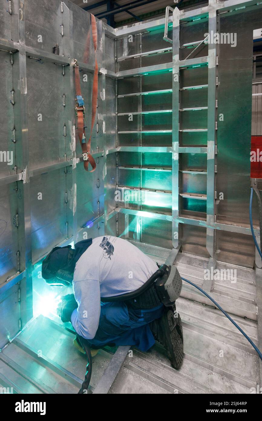 Welder at work welding aluminium. Shipbuilding Industry. Aluminium hull ...