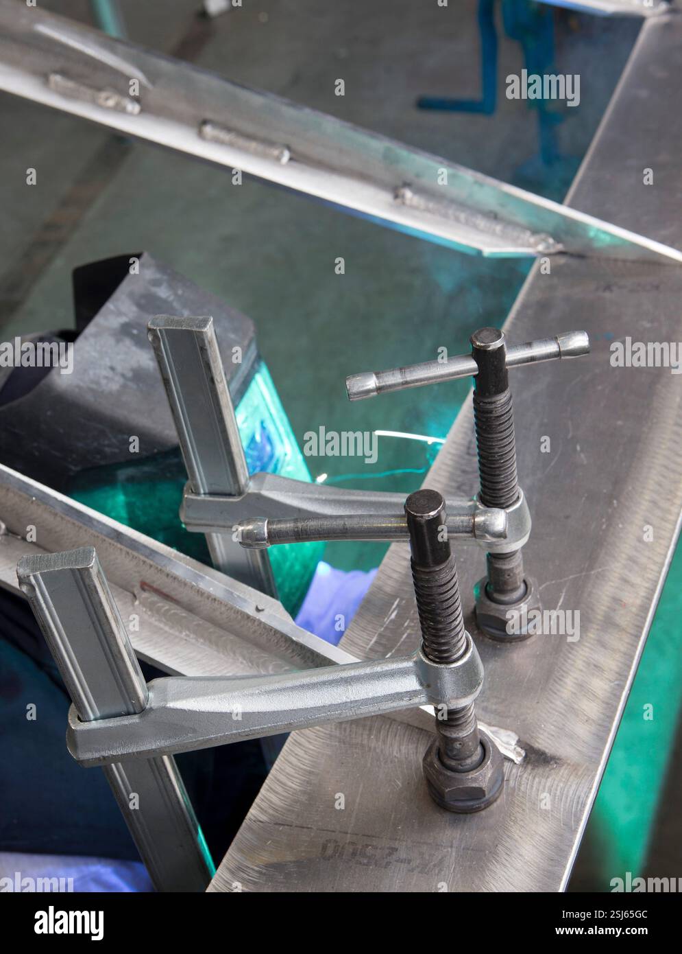 Welder at work welding aluminium. Shipbuilding Industry. Aluminium hull ...