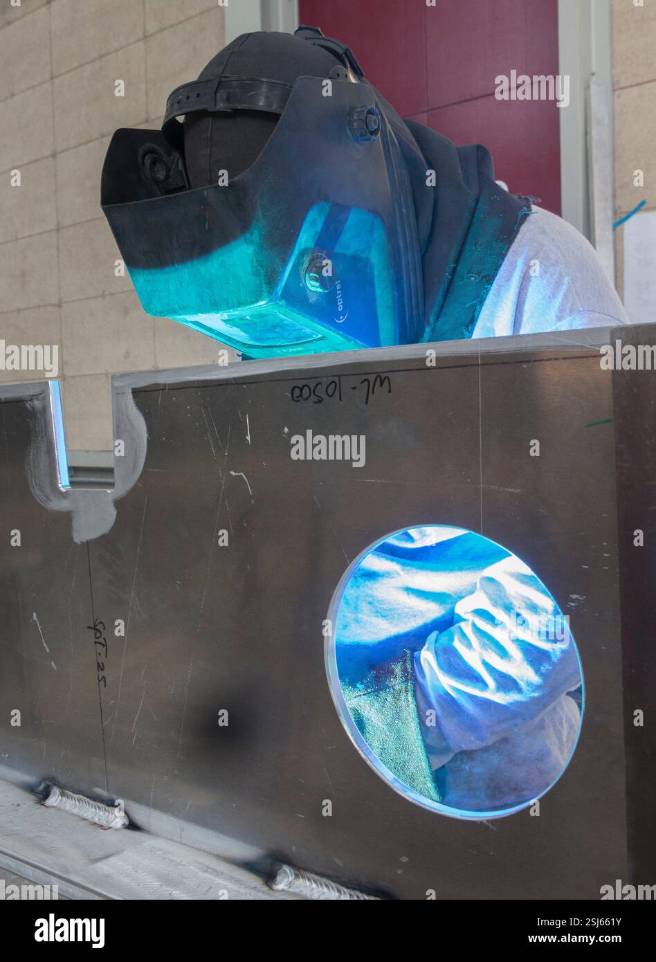 Welder at work welding aluminium. Shipbuilding Industry. Aluminium hull ...