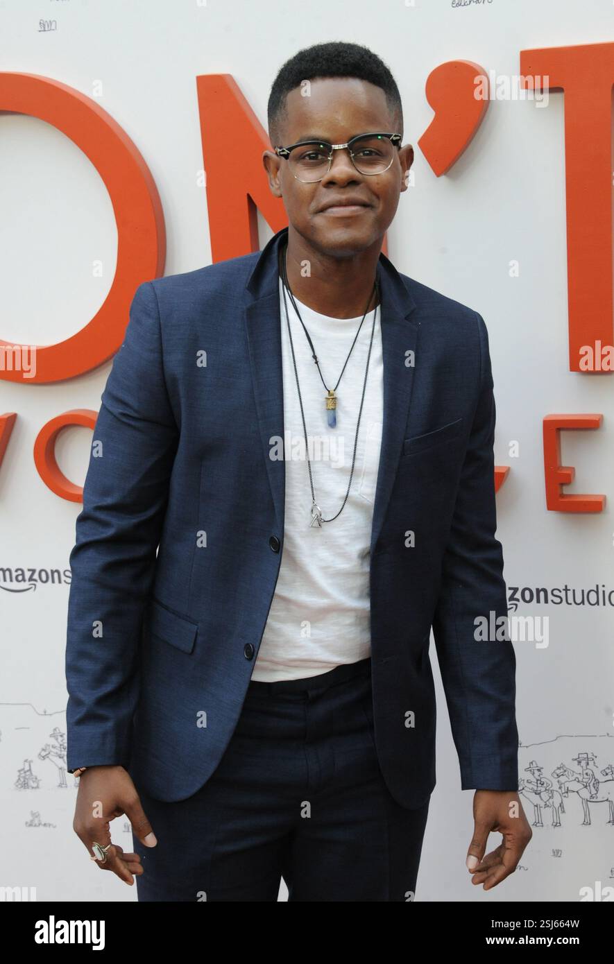 Dion R. Earl arriving at the premiere of 'Don't Worry, He Wont Get Far ...