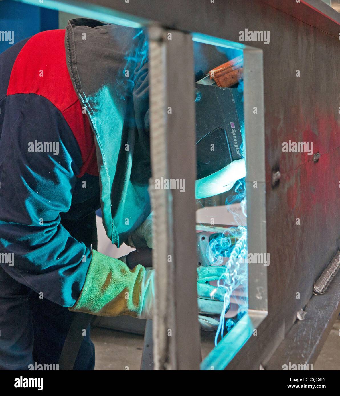Welder at work welding aluminium. Shipbuilding Industry. Aluminium hull ...